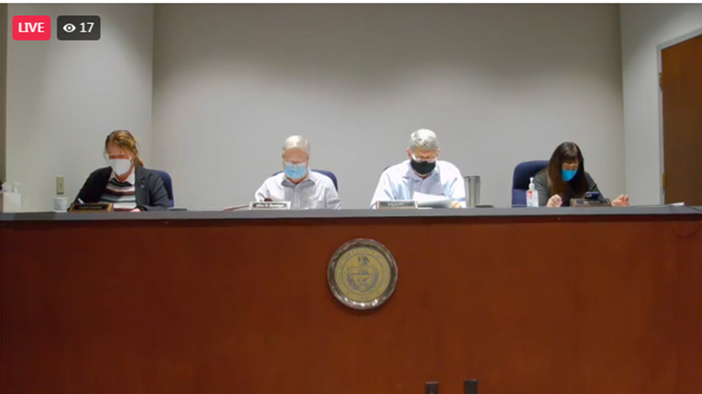 Commissioners approve 2022 pay hikes; elevate Greg Strouse to fulltime ...