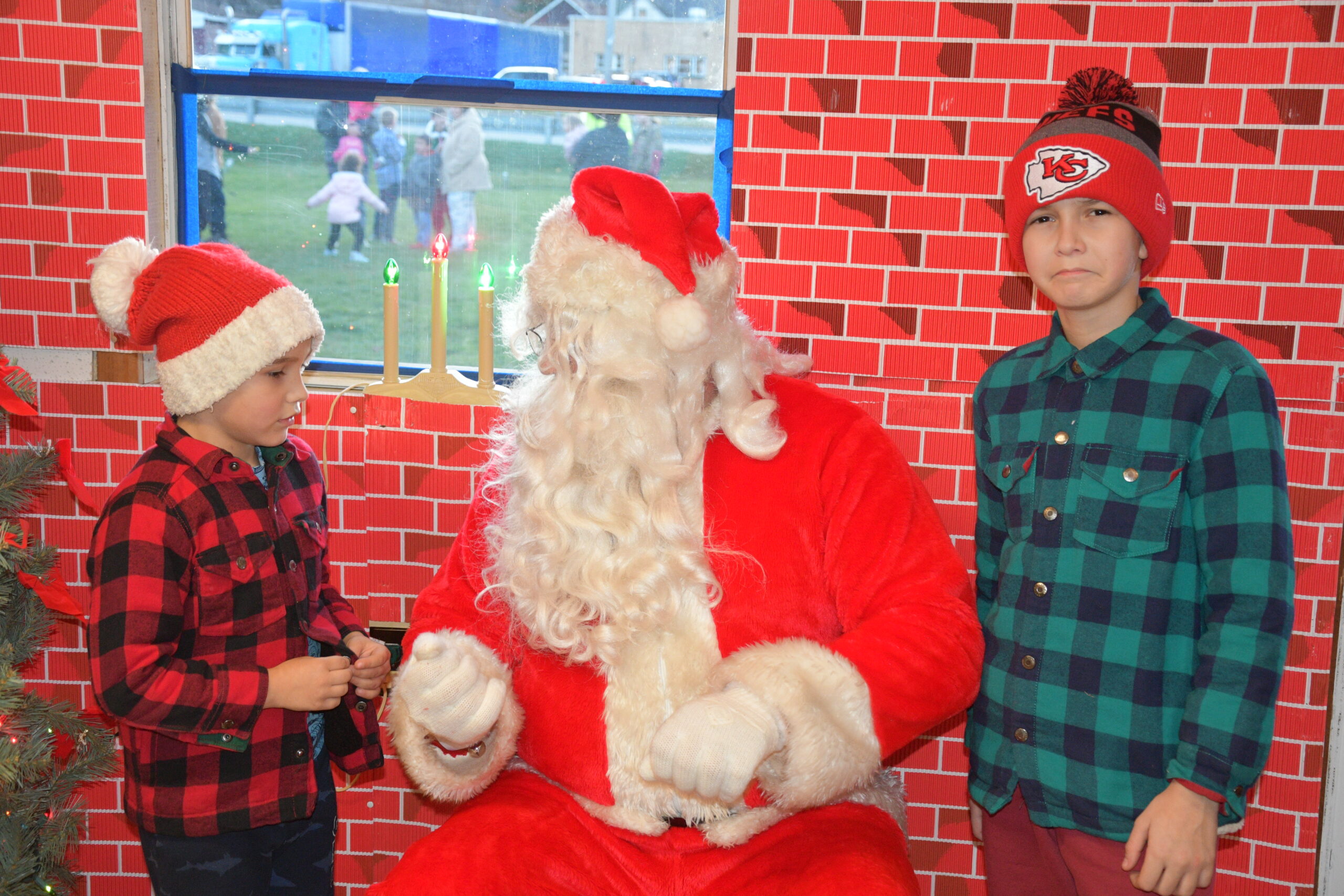 Ozzy and Otis Emerick with Santa – The Record Online