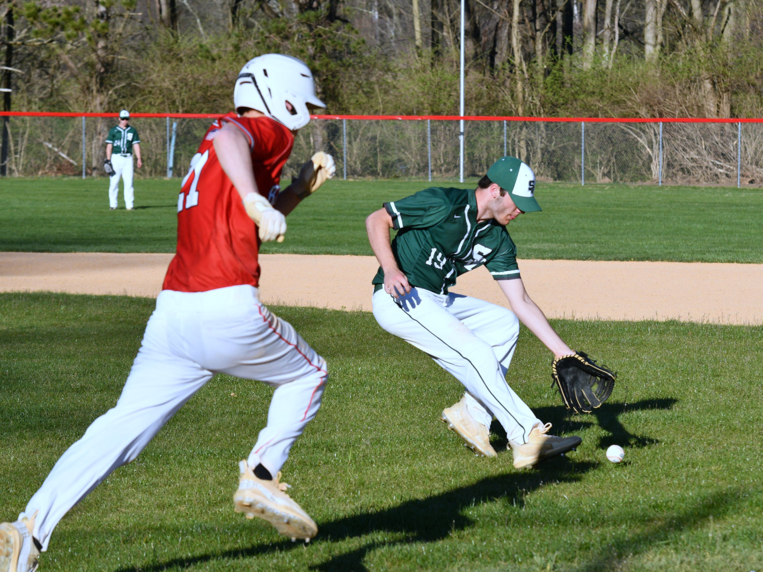 Cayden Weaver fielding a grounder – The Record Online